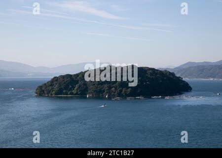 Aoshima Island in front of the beautiful fishing village of Ine in ...