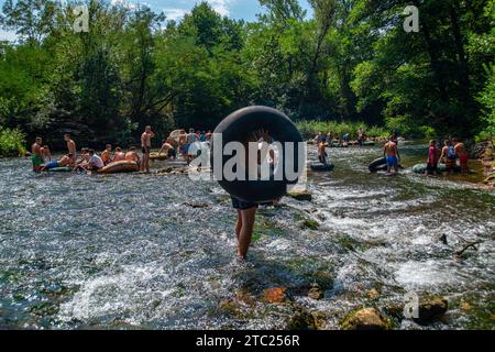 20 August 2023 Nisava river, Serbia, Group of young people enjoy river ...