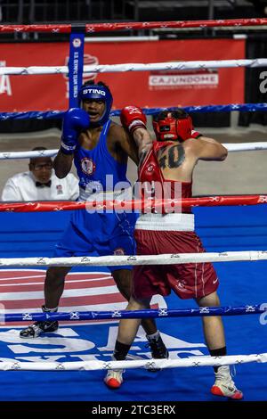 Nathan Lugo (red) fights Obed Bartee-El (blue) during the Olympic ...