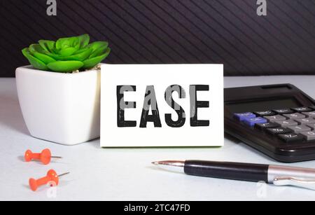 The word "Easy" written in isolated vintage wooden letterpress type on ...