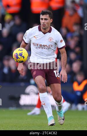 Luton, UK. 10th Dec, 2023. Jacob Brown of Luton Town tussles with ...