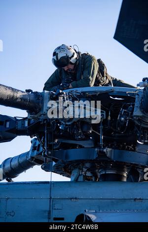 USS Harpers Ferry conducts an underway replenishment with USNS Matthew ...