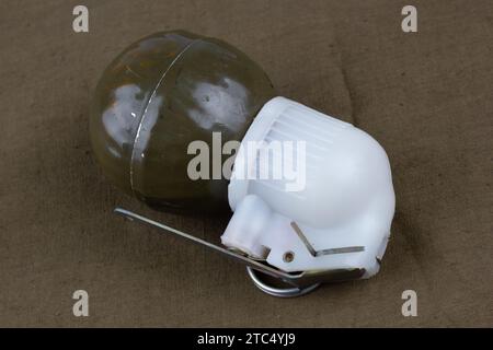 Soviet hand grenade RGN on khaki canvas background Stock Photo - Alamy