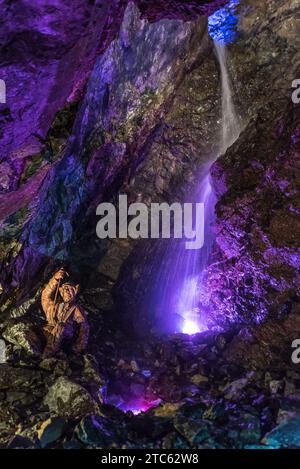 Underground waterfall in an old gold mine and arsenic Stock Photo - Alamy