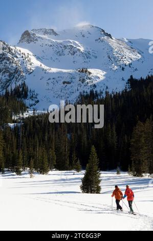 Two people snowshoeing on Cameron Pass, Colorado Stock Photo - Alamy