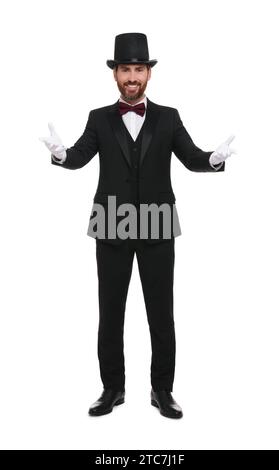Happy magician in top hat holding wand on white background Stock Photo ...