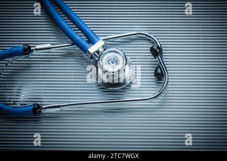 Medical auscultoscope on striped background top view Stock Photo - Alamy