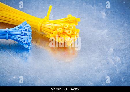 Bunch of tying cables on metallic background construction concept Stock ...