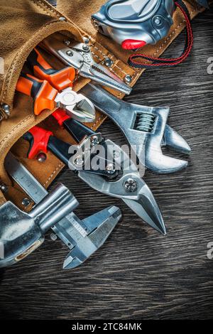 Building belt construction tooling on wooden board Stock Photo - Alamy
