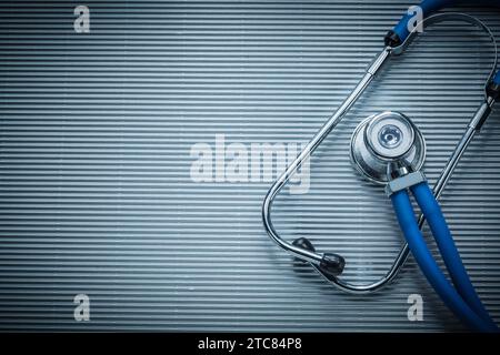 Medical auscultoscope on striped background top view Stock Photo - Alamy