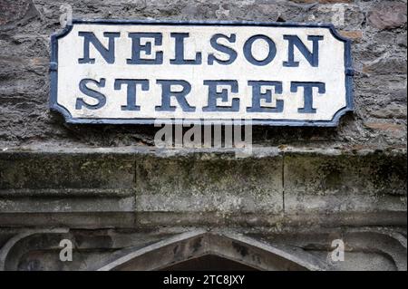 Street sign above the archway to Broad Street from the historic city ...