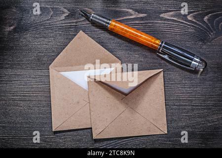 Set of retro post envelopes fountain pen on wooden board Stock Photo ...