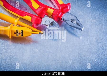 Electric tester pliers nippers on metallic background electricity ...