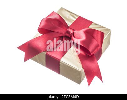 Present wrapped in glittery paper with red bow isolated on white Stock ...
