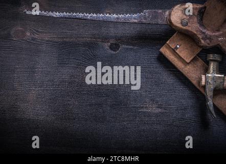 Vintage messy construction tools on wooden board Stock Photo - Alamy