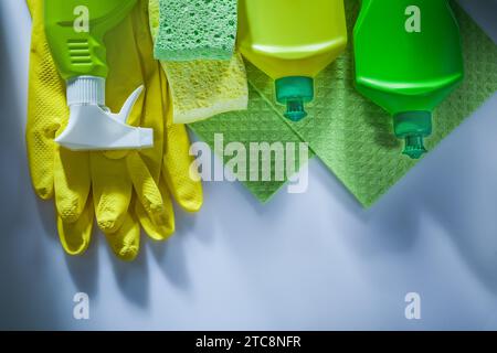 Cleaning cloth bottle sprayer protective gloves sponges on white ...