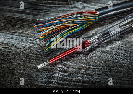 Electric wires on wooden board electricity concept Stock Photo - Alamy
