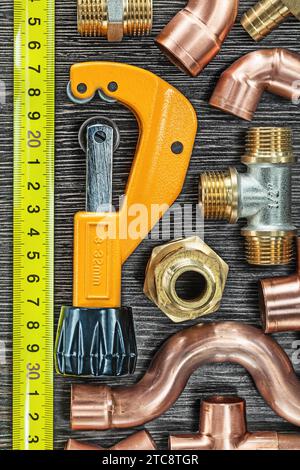 Copper water pipes Tape measure Pipe shears Stock Photo - Alamy