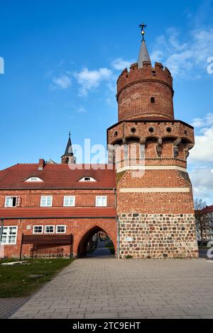 medieval fortifications with a round tower and a stone wall in Prenzlau ...