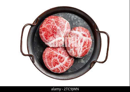 Raw pork cutlet, Crepinette with spices and herbs. Black background ...
