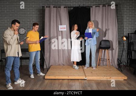 Actors casting on stage in audition room Stock Photo - Alamy