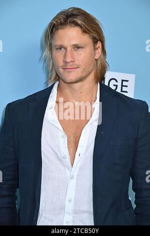 Joe Davidson attends the premiere of "Anyone But You" at AMC Lincoln ...