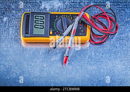 Digital electrical tester test leads on metallic background Stock Photo ...