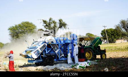 Indian Combine harvester in a rural village. Andhra Pradesh, India ...