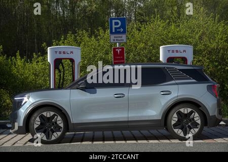 New All-Electric Ford Explorer at Tesla charging station Stock Photo ...