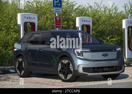 New All-Electric Ford Explorer at Tesla charging station Stock Photo ...