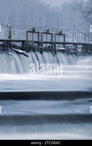 Dam Spillway Water Rushing vertical. A dam spillway as the water pours ...