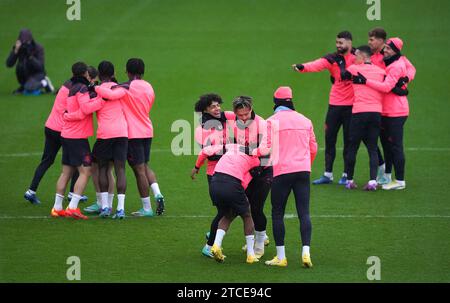 Manchester City huddle during training session at the City Football ...