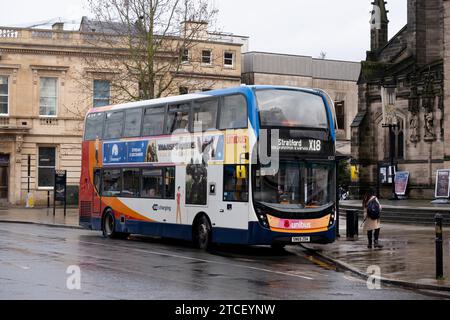 Stagecoach X18 bus service outside Holy Trinity parish church ...