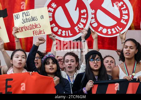 Young activists protest on the last day of COP28, UN Climate Change ...
