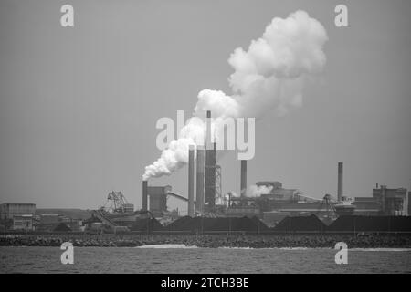 Industrial Factories Producing Pollution by the Ocean Stock Photo - Alamy