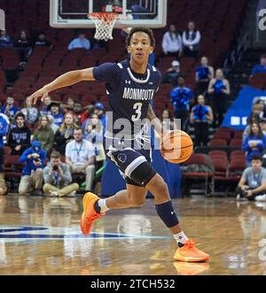 Monmouth Hawks guard Jakari Spence (3) with the ball during a ...