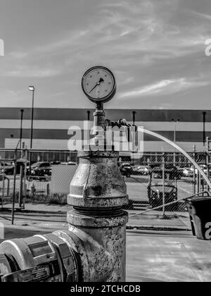 soil vapor extraction test well header with pressure gauge and sample ...