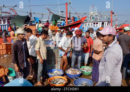 Brisk activity, wheeling and dealing, at the Old Port fishing harbor ...