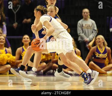 LSU guard Last-Tear Poa bites her nail during the second half of a game ...