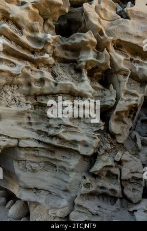 Melted wax-looking erosion patterns in the sandstone formations in ...