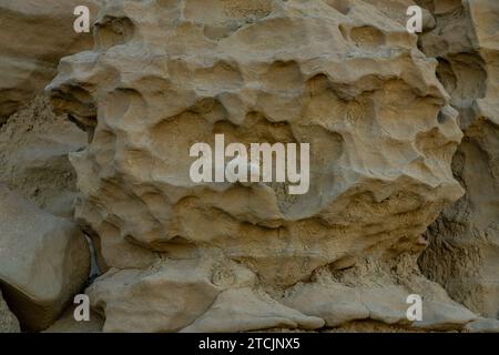 Melted wax-looking erosion patterns in the sandstone formations in ...