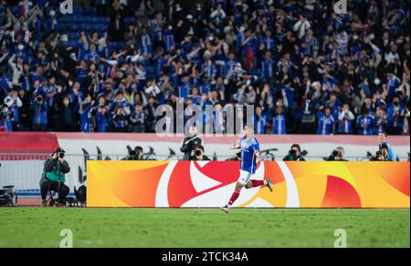 Tokohama, Japan. 13th Dec, 2023. Cryzan Barcelos (2nd L) of Shandong ...