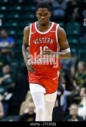 Dayton, USA. 12th Dec, 2023. Drey Carter (2) saves the ball from going ...