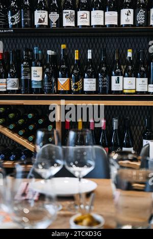 Wine Tasting Setup with Bottles and Glasses at Fair Stock Photo - Alamy