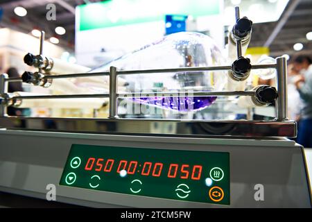 Laboratory shaker with heating and flask with solution Stock Photo - Alamy