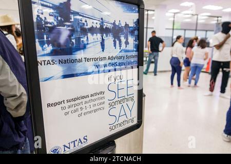 Concourse signs at Miami airport Stock Photo - Alamy