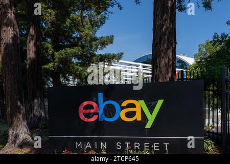 ebay headquarters in San Jose California. An employee carries a ...