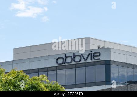 AbbVie office building with logo on glass facade under blue sky, South ...