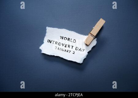 Torn note paper with introvert writing. World Introvert Day. January 2 ...