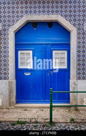 Old building facade with Lisbon traditional tiles. Lisbon, Portugal ...